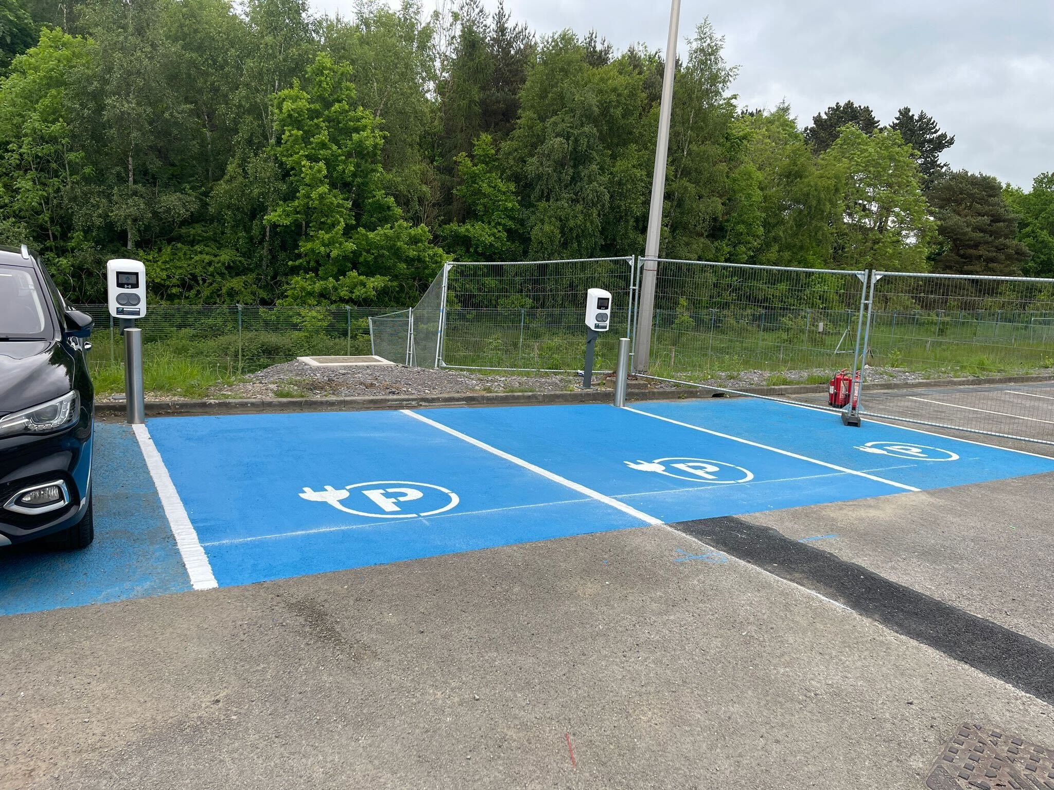 Clean and Retrieve | EV Charging Bay Marking